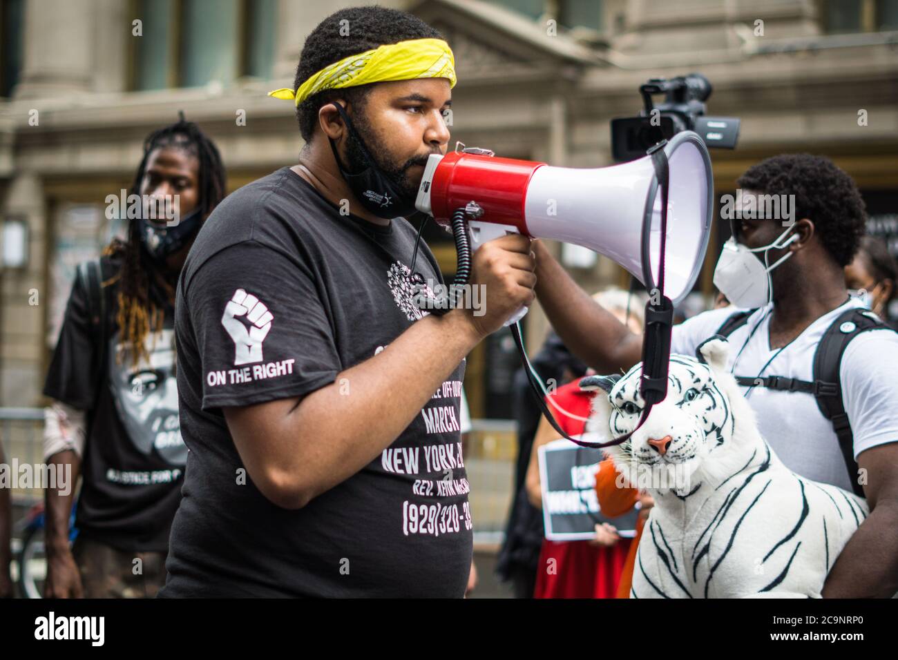 Rev. Kevin McCall and the Crisis Action Center lead a march from Times ...