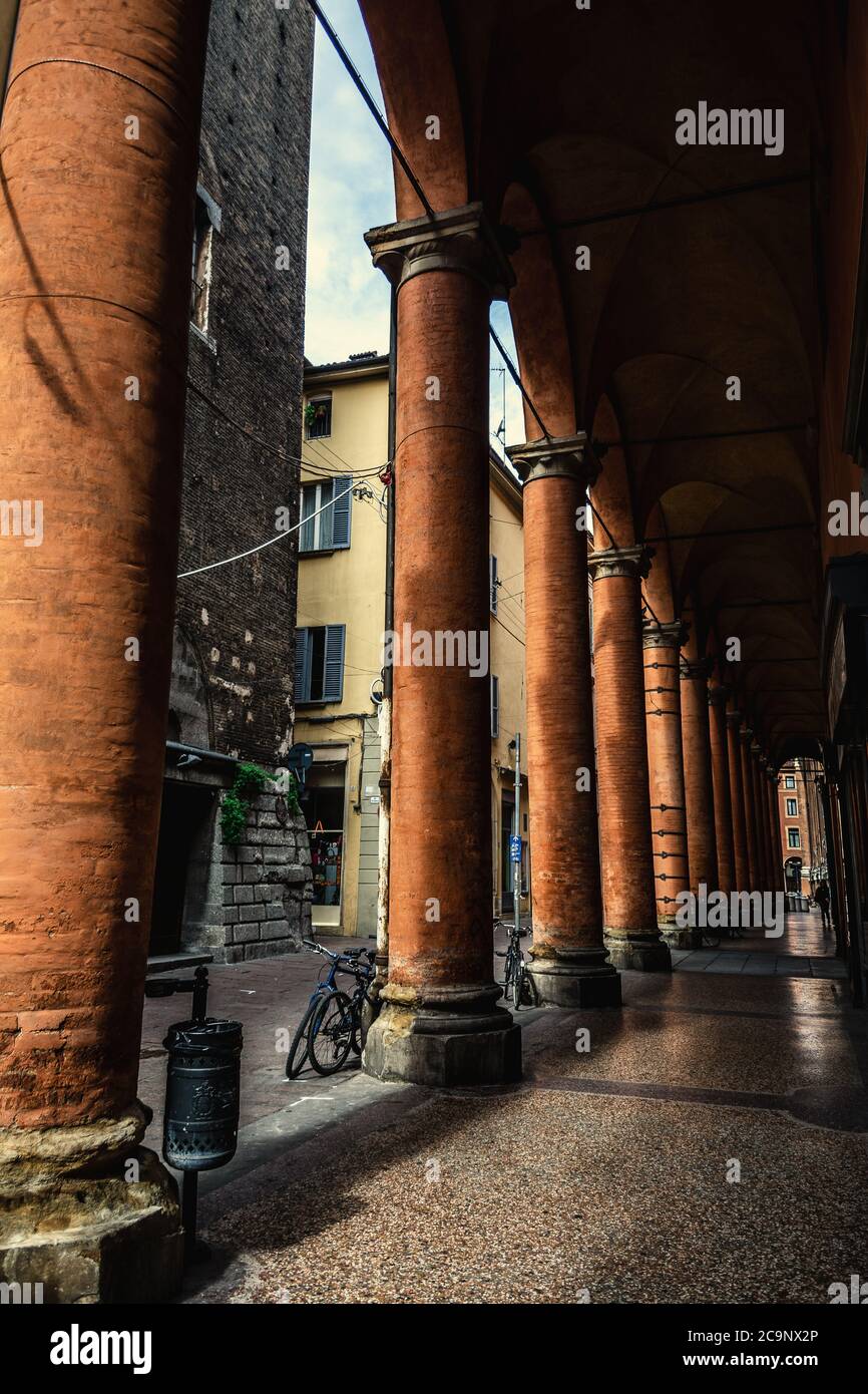 Orange arcade in Bologna, Italy Stock Photo - Alamy