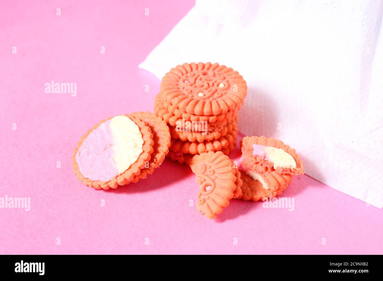 Sandwich biscuits, Cream biscuits, Pink Cookies Stock Photo - Alamy