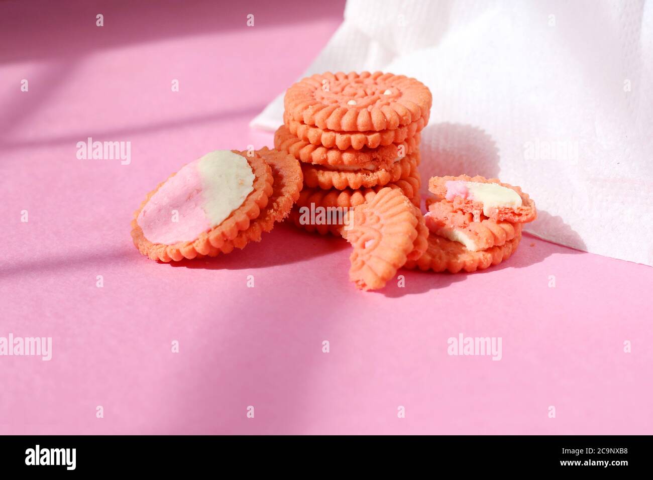 Sandwich biscuits, Cream biscuits, Pink Cookies Stock Photo - Alamy