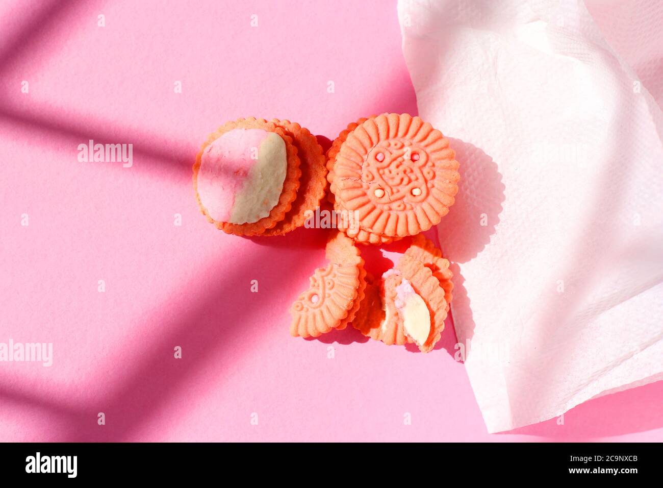 Sandwich biscuits, Cream biscuits, Pink Cookies Stock Photo - Alamy