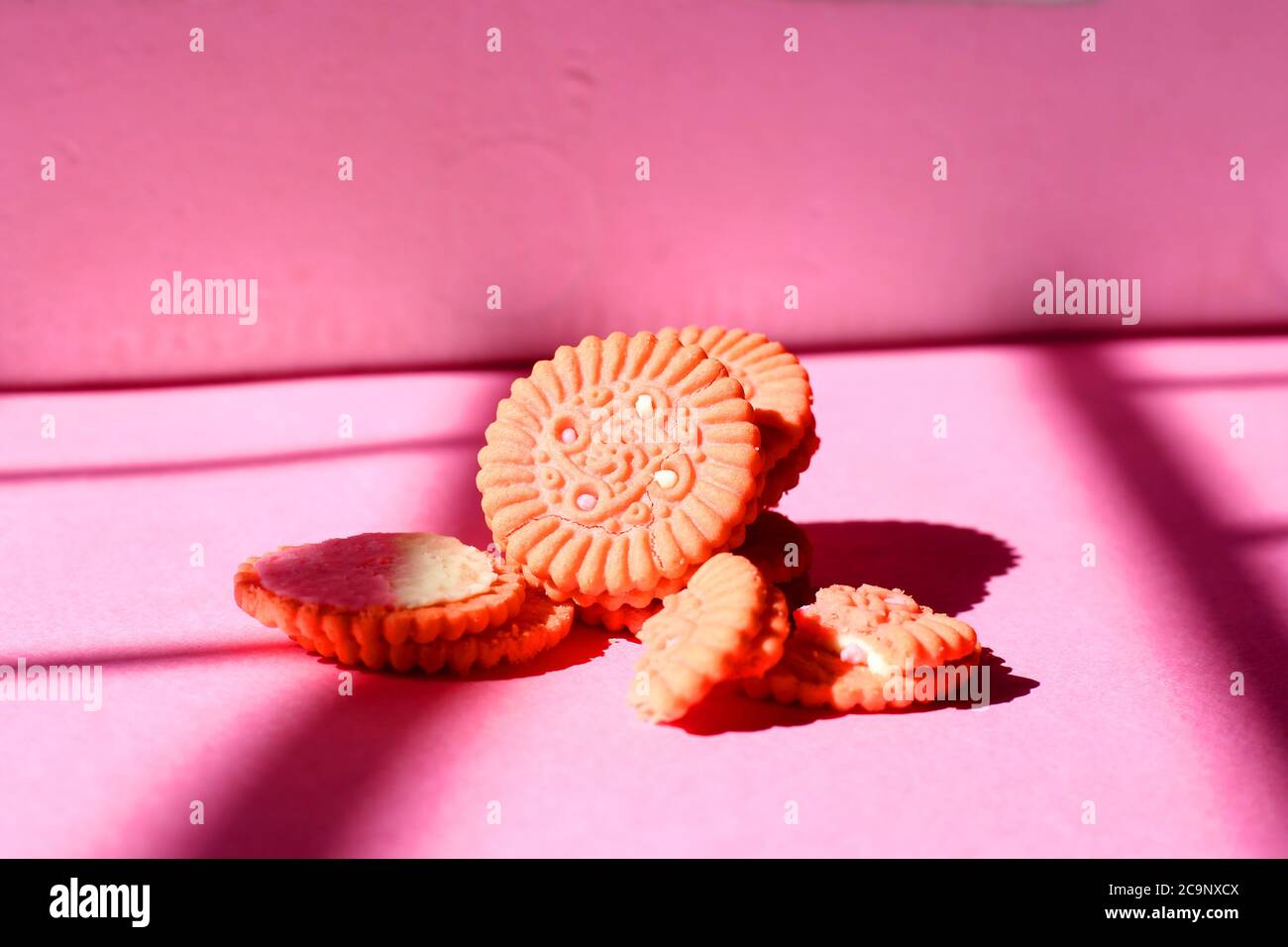 Sandwich biscuits, Cream biscuits, Pink Cookies Stock Photo - Alamy