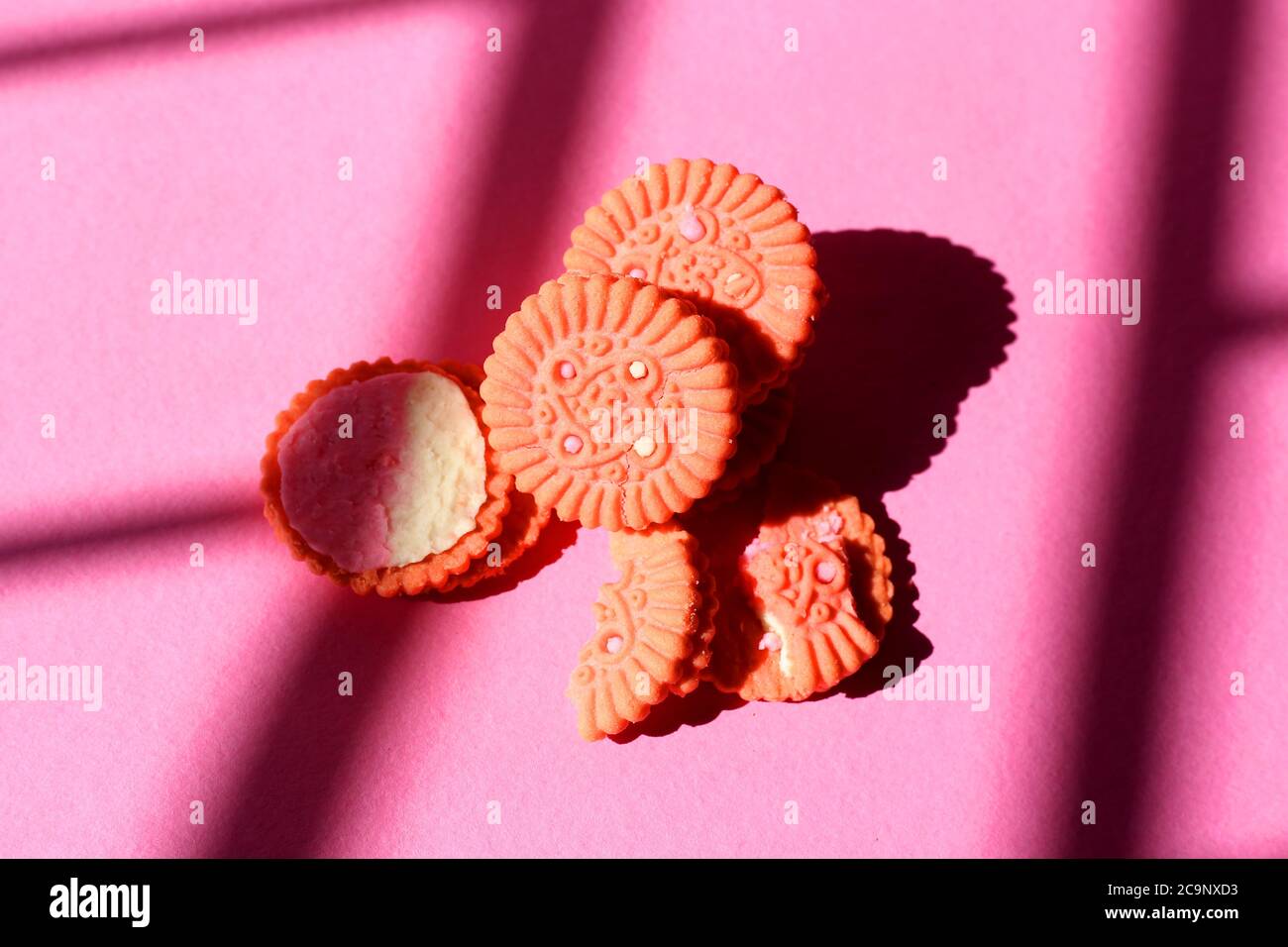 Sandwich biscuits, Cream biscuits, Pink Cookies Stock Photo - Alamy