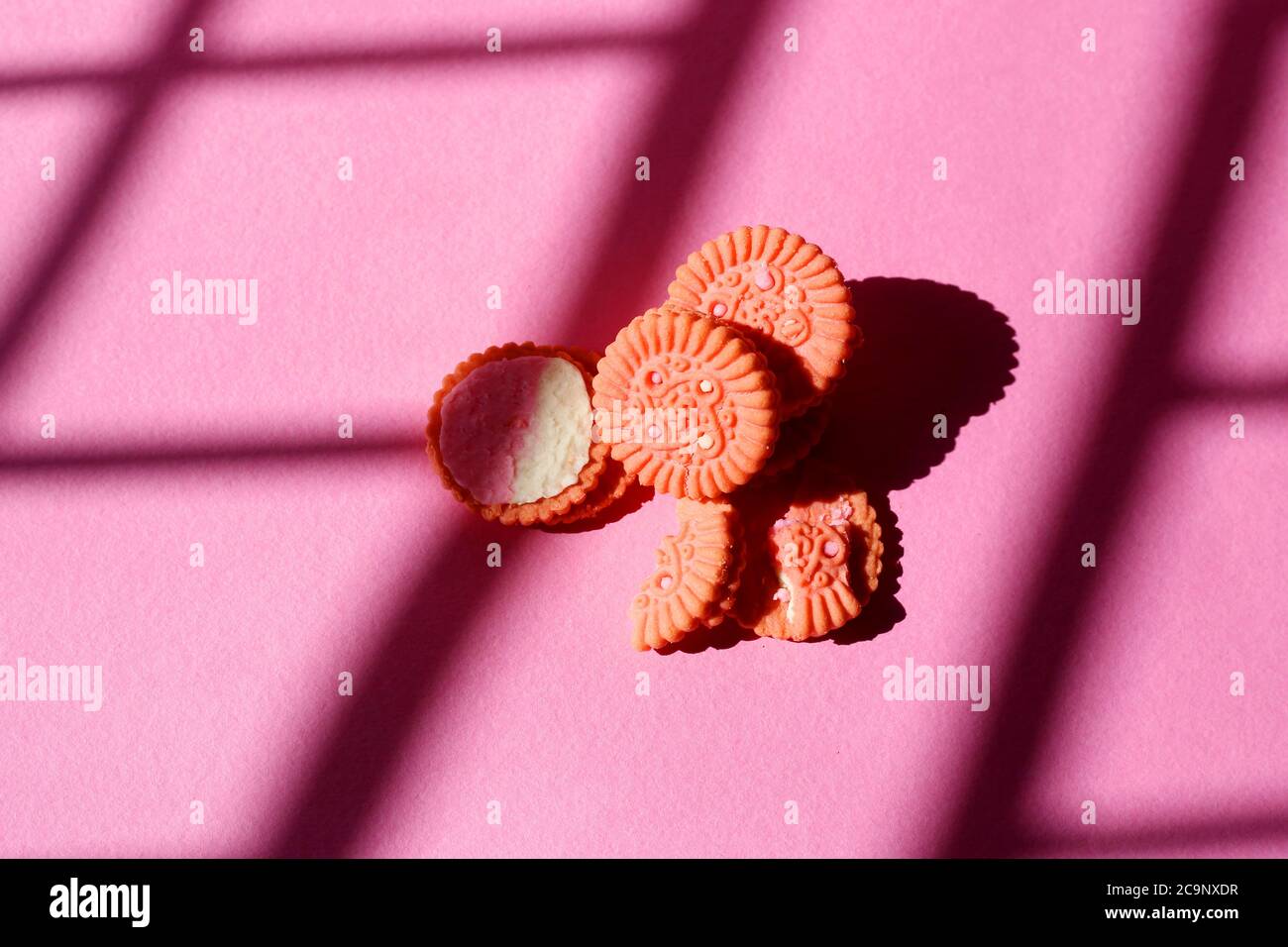 Sandwich biscuits, Cream biscuits, Pink Cookies Stock Photo - Alamy