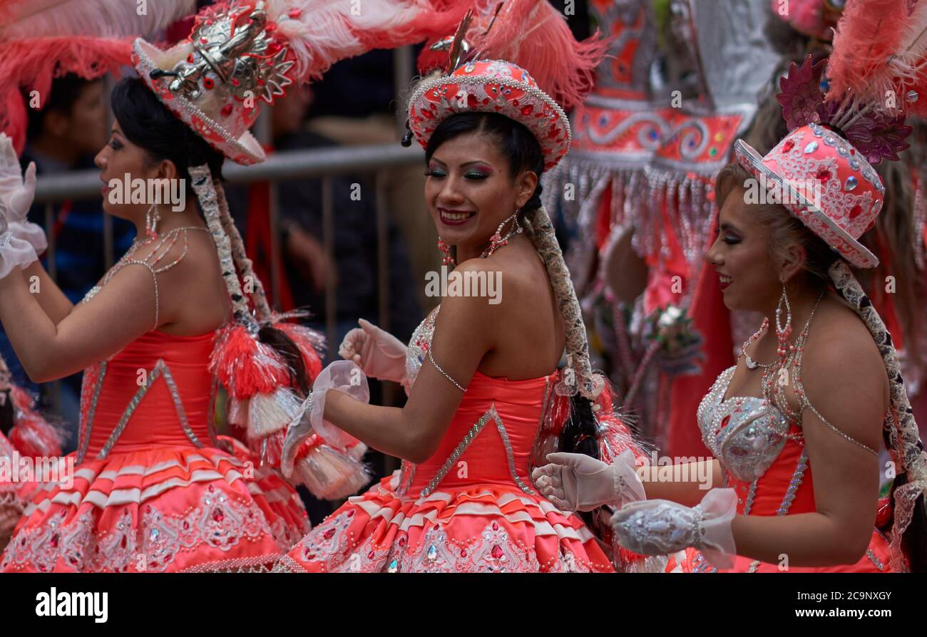 Morenada dancers in ornate costumes parade through the mining city of ...
