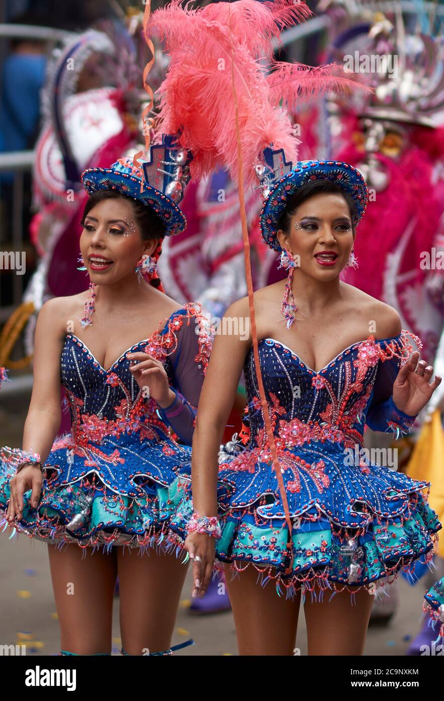 Morenada dancers in ornate costumes parade through the mining city of ...