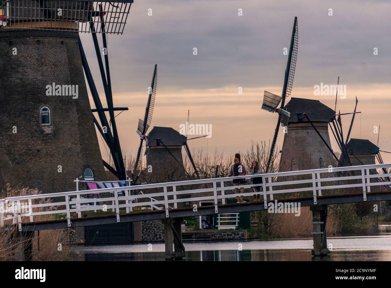 Dramatic cloudy sky over the famous Windmills in Kinderdijk Holland ...