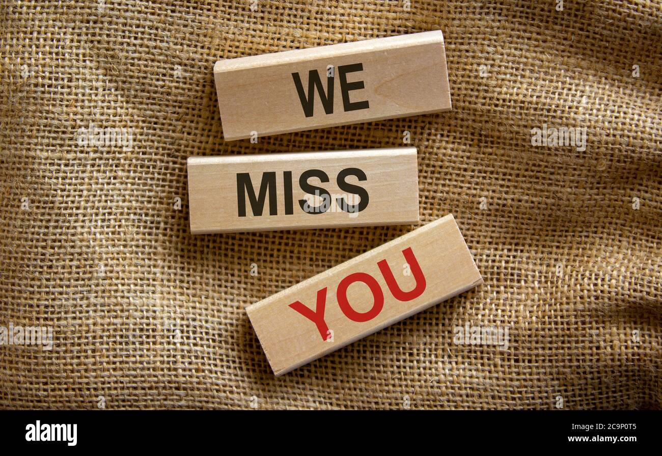 Wooden blocks form the text 'we miss you' on beautiful canvas ...