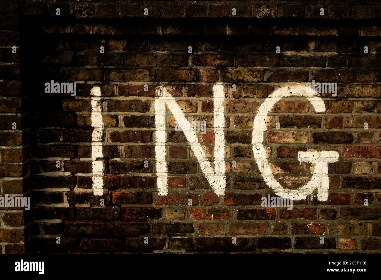 Ing on wall hi-res stock photography and images - Alamy
