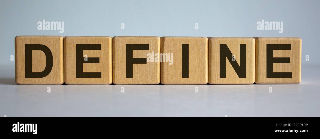 Concept word 'define' on cubes on a beautiful white background ...