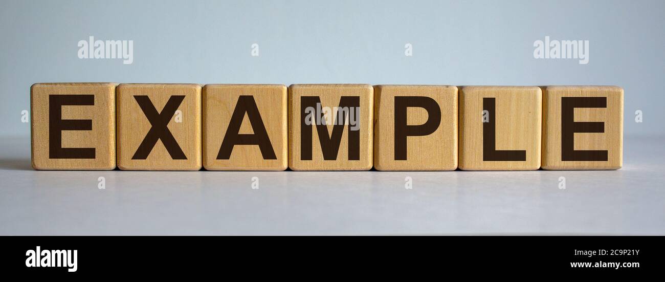 Concept word 'example' on cubes on a beautiful white background ...