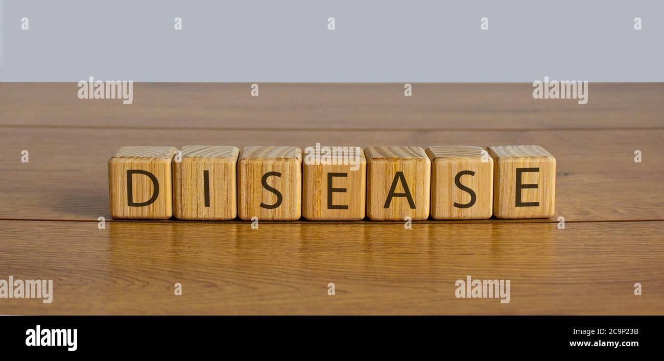 COVID-19 Pandemic Coronavirus concept. Wooden cubes with the ...