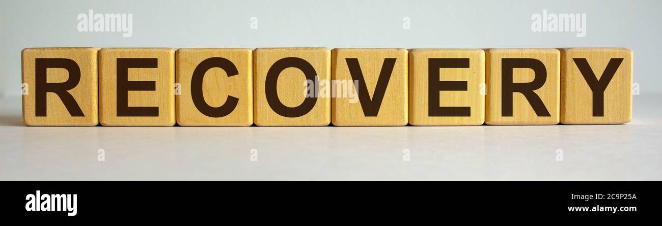 Concept word 'recovery' on cubes on a beautiful white background Stock ...