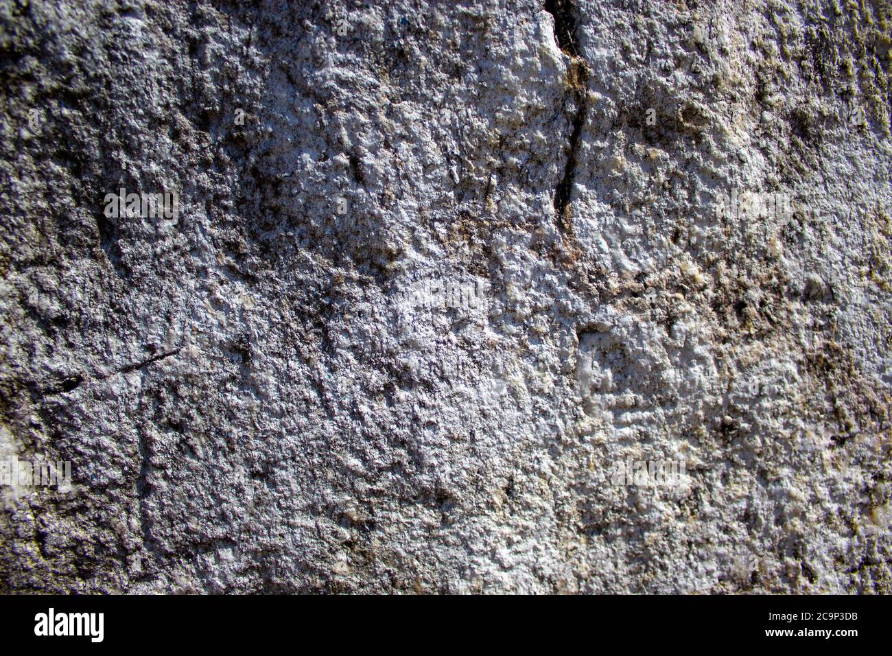 Unpolished granite surface. Warm sunlight. Beautiful background ...