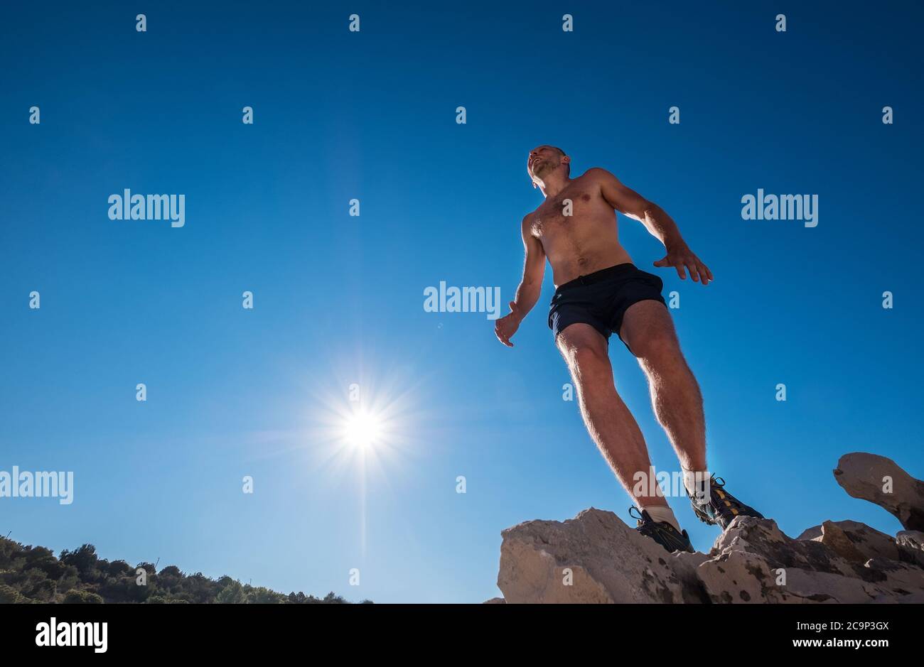 Muscular male runner running hi-res stock photography and images - Alamy