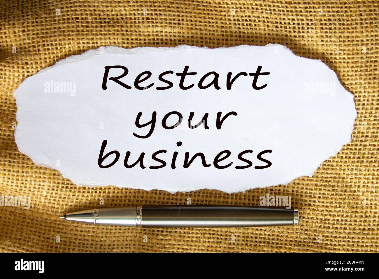 The text 'restart your business' on white paper. Metalic pen. Beautiful ...