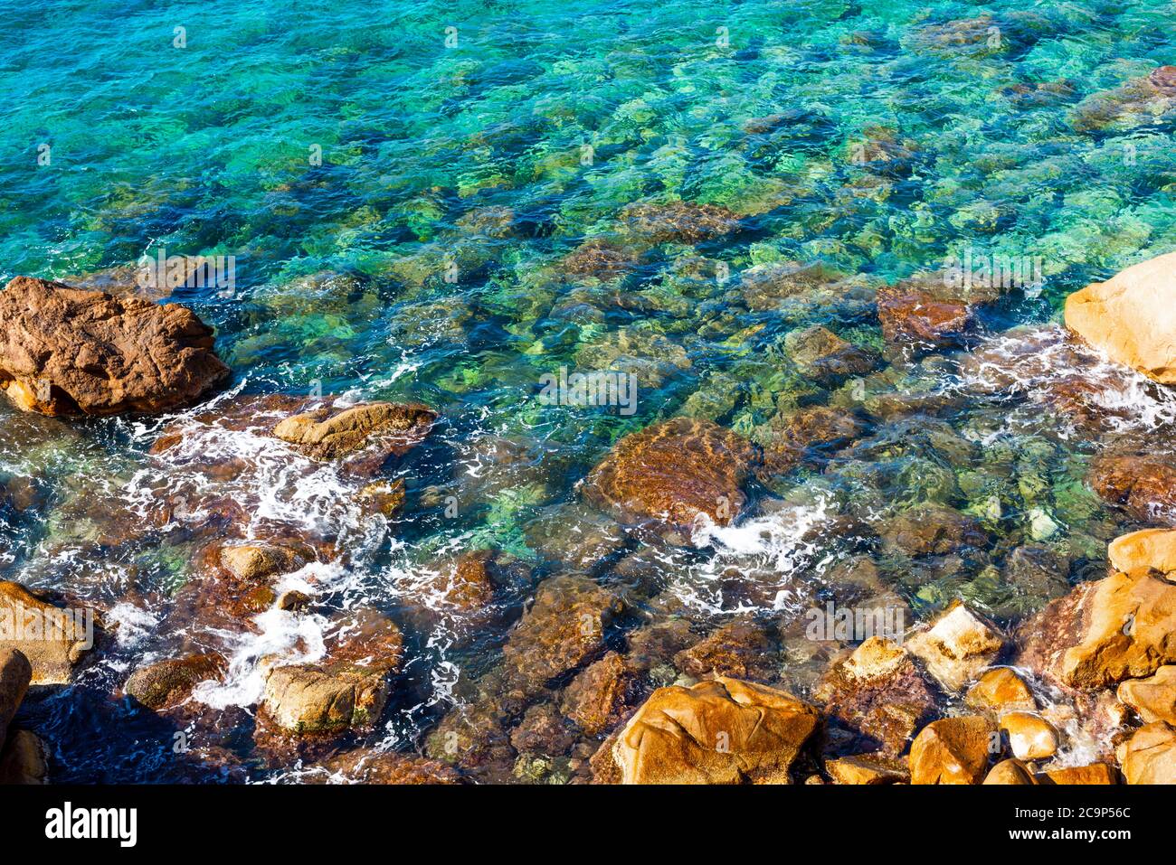 Clear water and rocks in Costa Paradiso. Sardinia, Italy Stock Photo ...