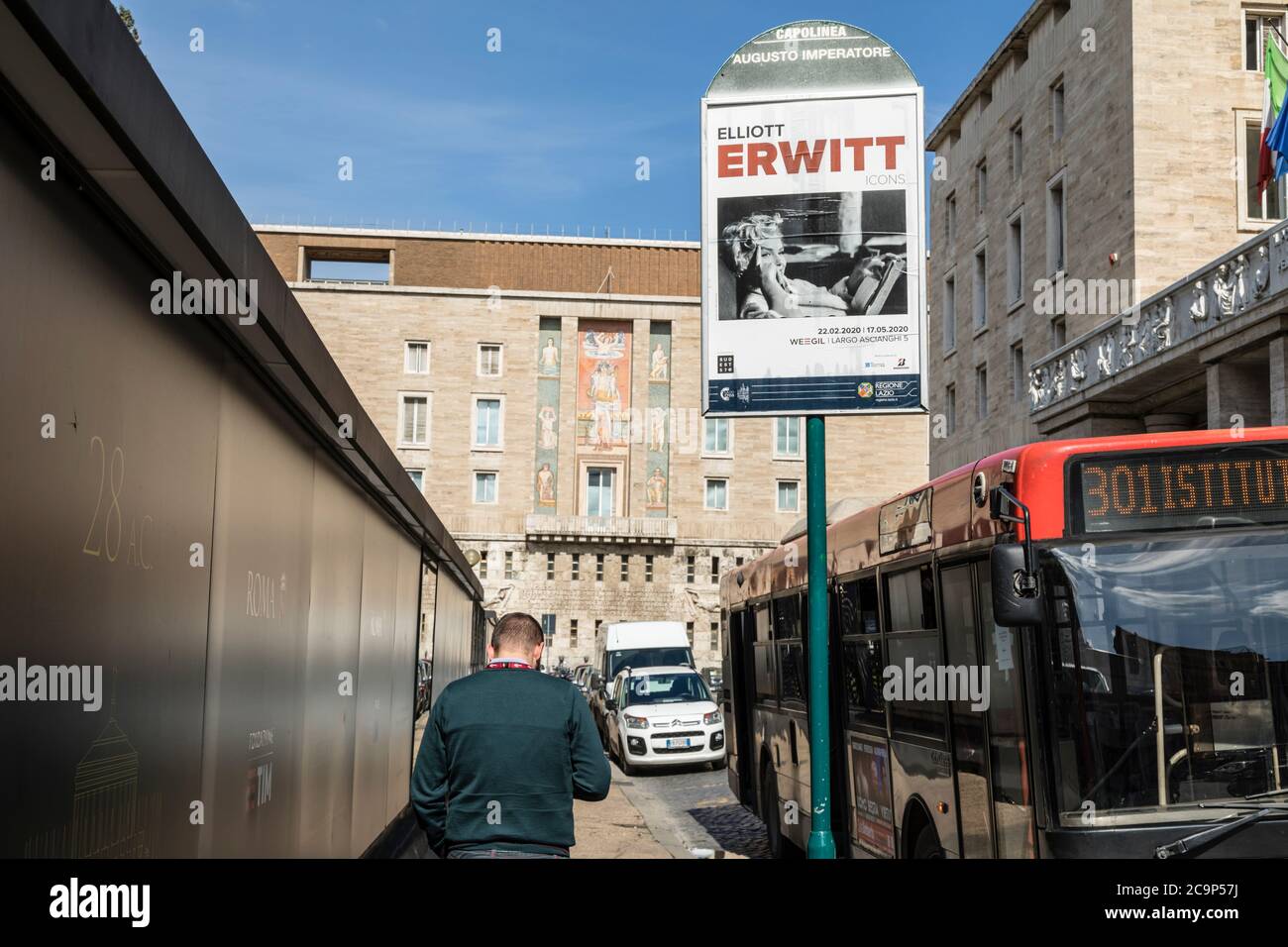 A poster advertising an exhibition of Elliot Erwit photographs, Rome ...