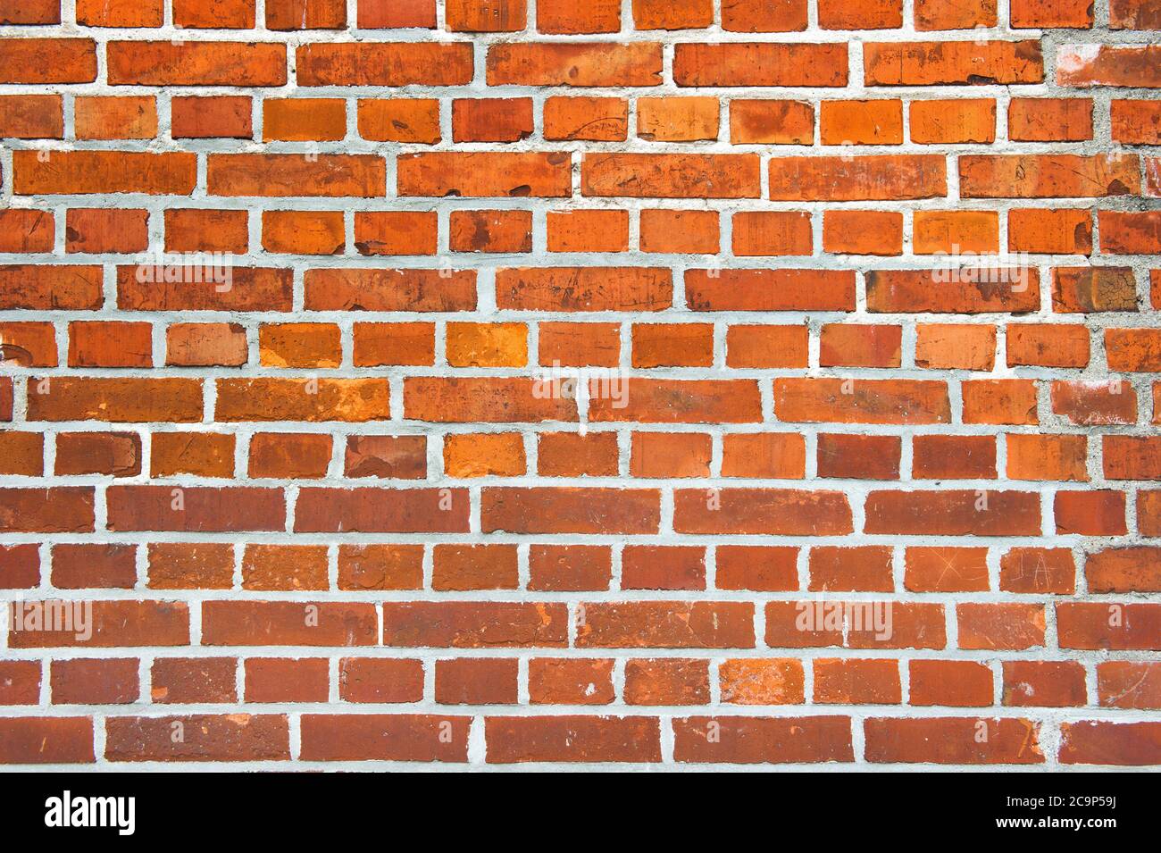 Red brick wall. Stone distressed texture background Stock Photo - Alamy