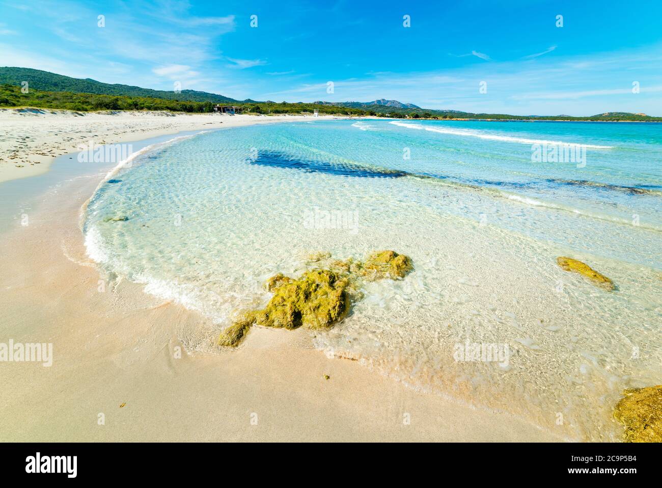 Rena Bianca beach on a clear day in Costa Smeralda. Sardinia, Italy ...