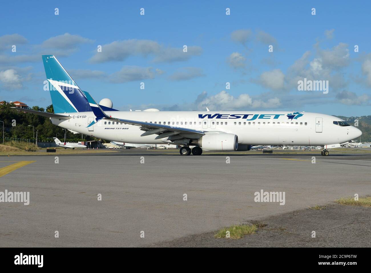 Westjet Airlines airplane Boeing 737 at St. Maarten Airport. Aircraft ...