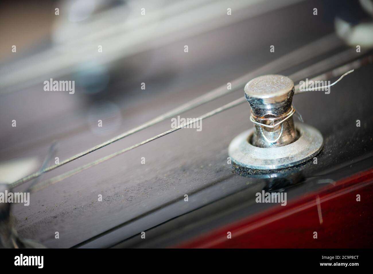 Extreme close up of an electric guitar tuning post Stock Photo - Alamy