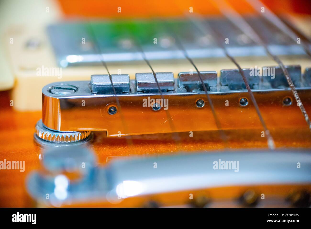 Extreme close up of an electric guitar string holder Stock Photo - Alamy
