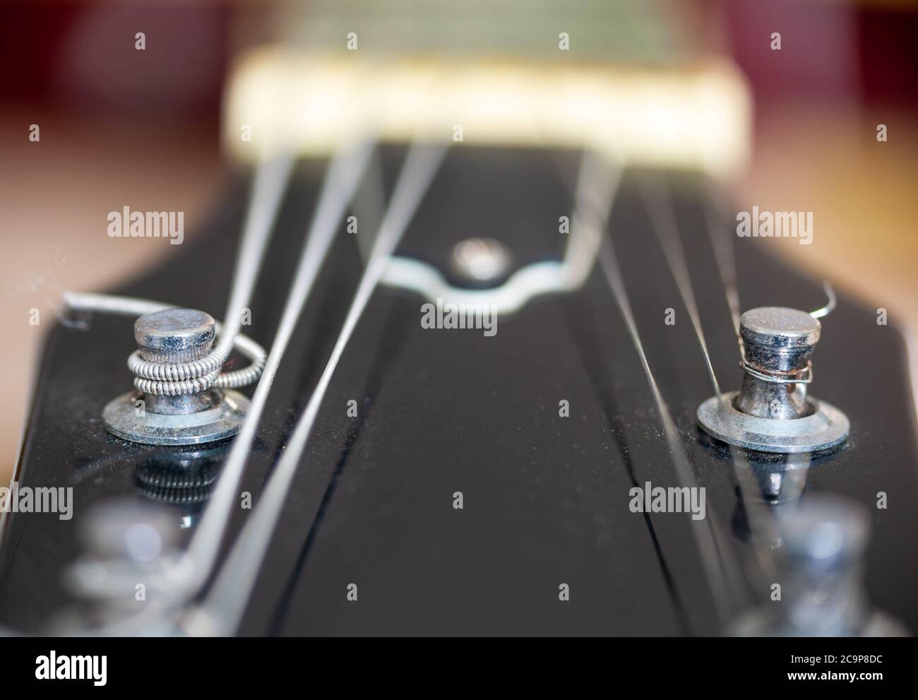 Extreme close up of electric guitar tuning posts Stock Photo - Alamy