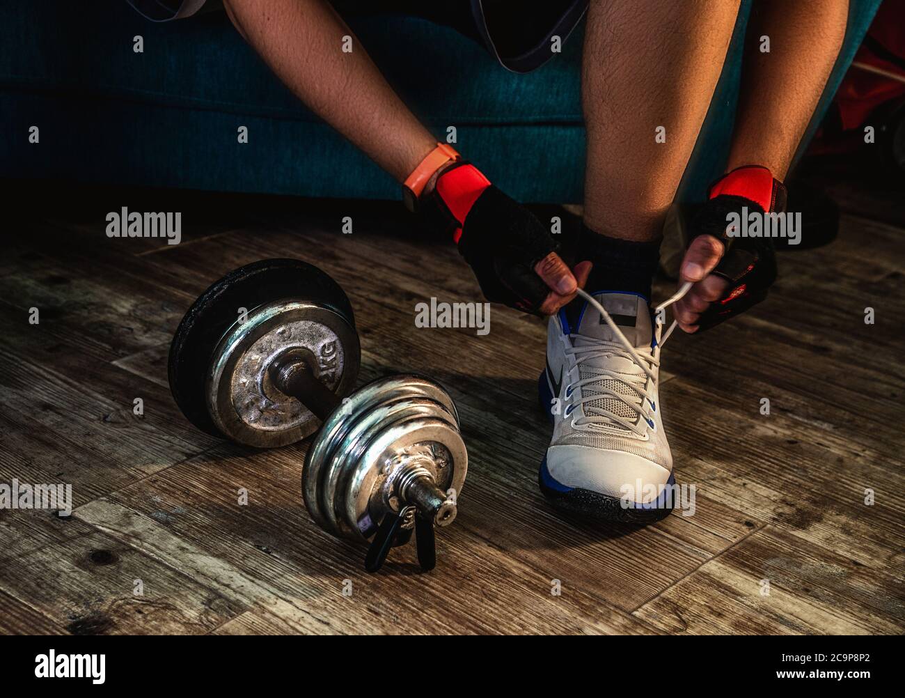 Man tying shoelaces before workout hi-res stock photography and images ...