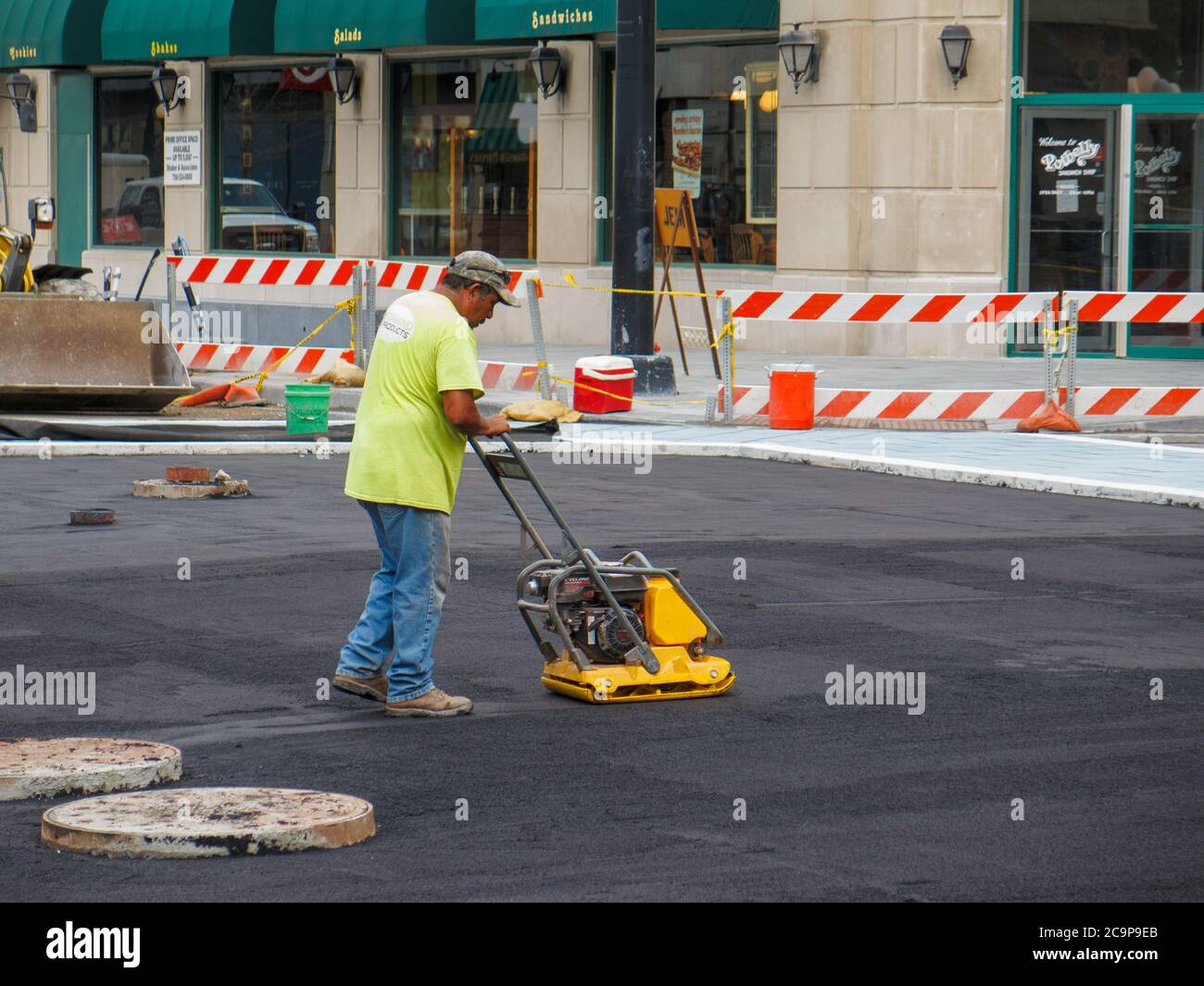 Asphalt tamper hi-res stock photography and images - Alamy