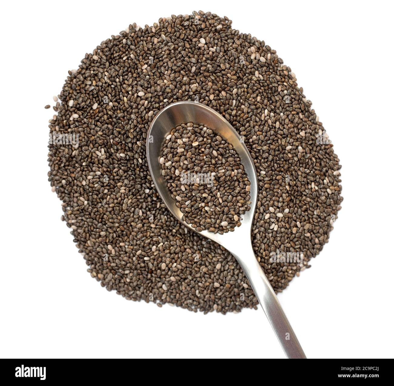 Chia seeds on a white background Stock Photo - Alamy
