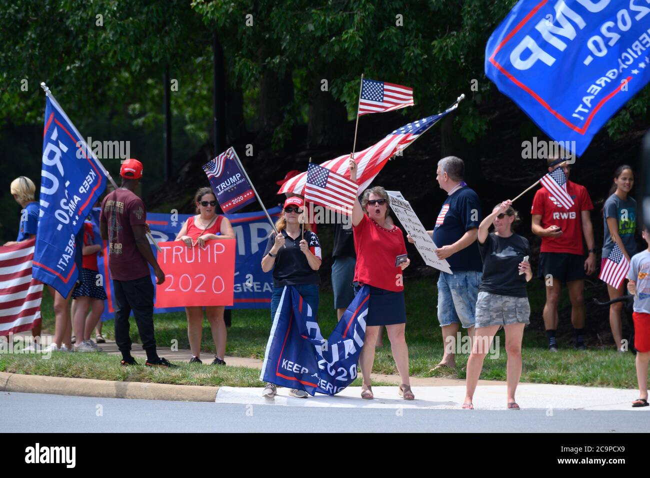 Supporters hold national flags hi-res stock photography and images - Alamy