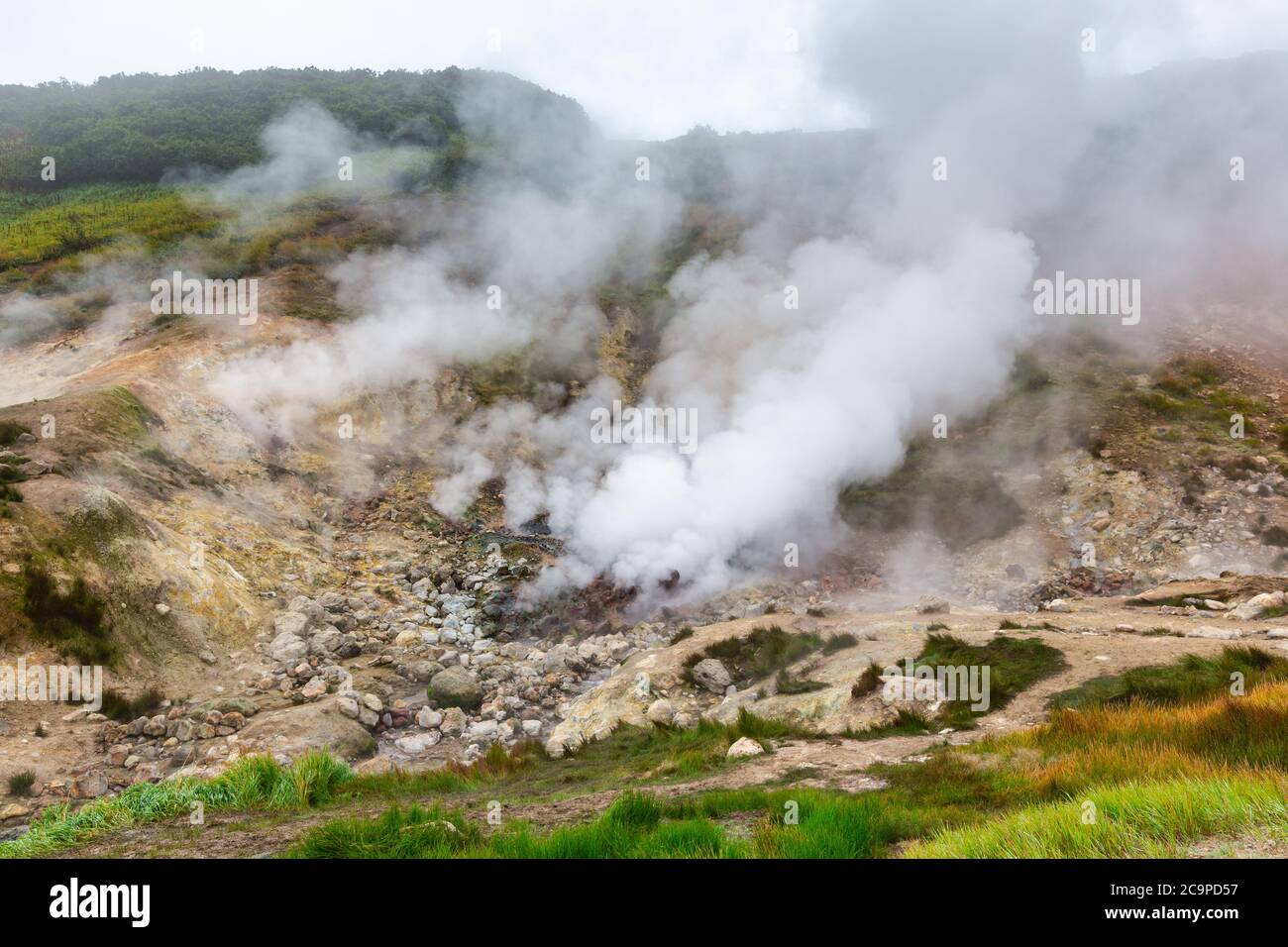 Mysterious view of volcanic landscape, aggressive hot spring, erupting ...
