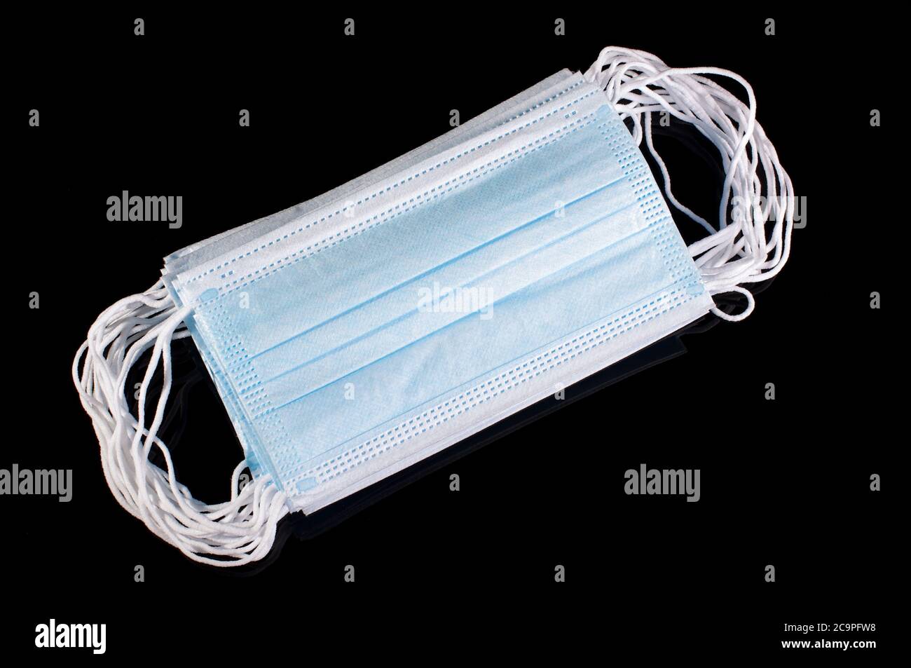Pile of medical virus protection disposable face mask isolated on the ...