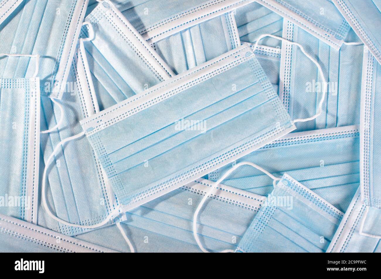 Many blue medical face masks for virus and infection protection Stock ...