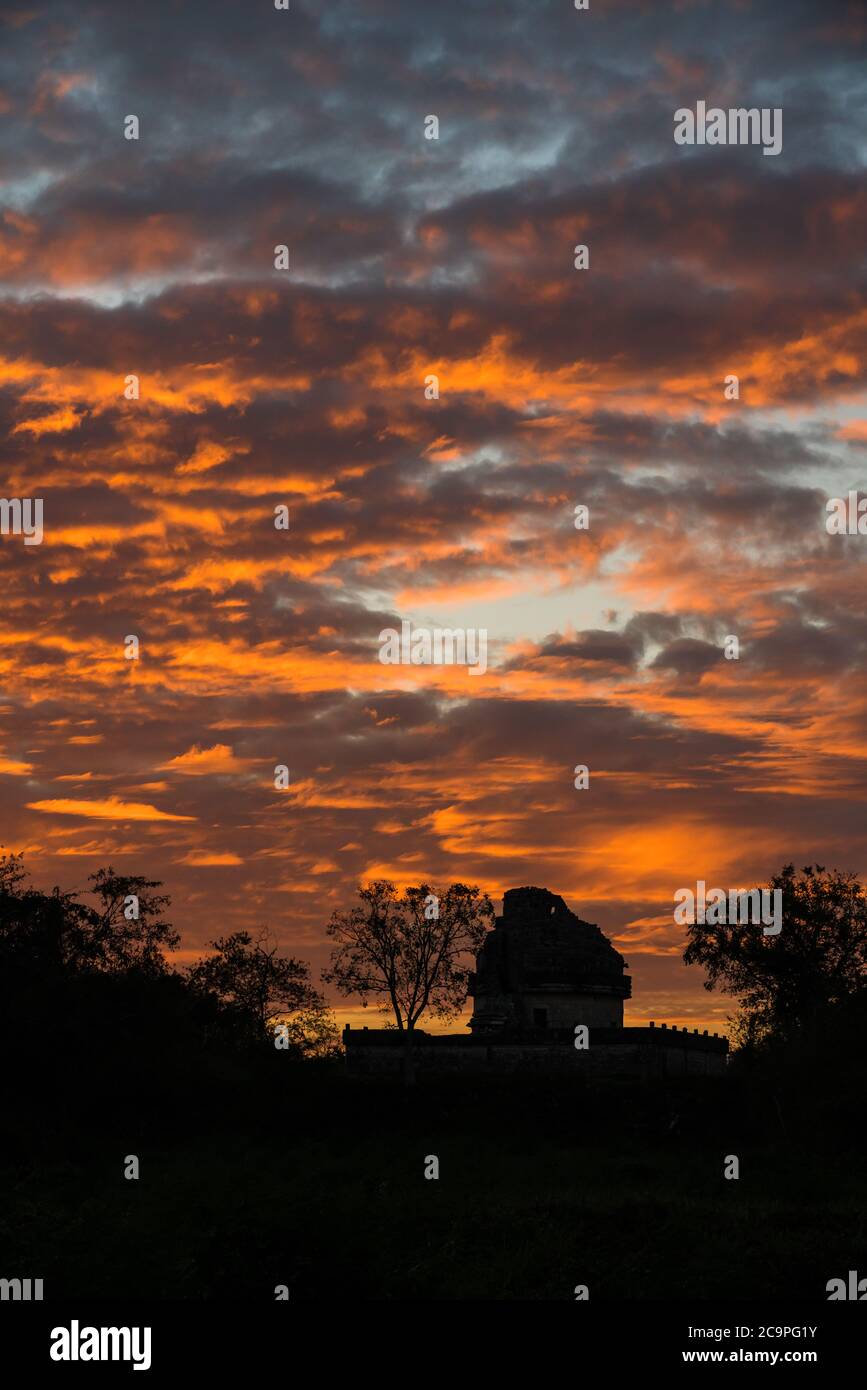 Colorful red sunset clouds and sky over the Caracol or the Observatory ...