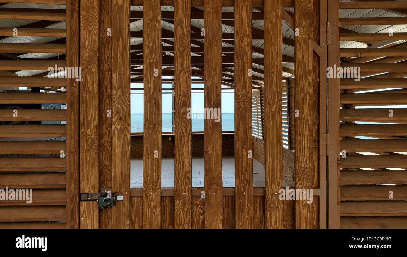 Wooden summer beach house made from natural wood planks. Exterior of ...