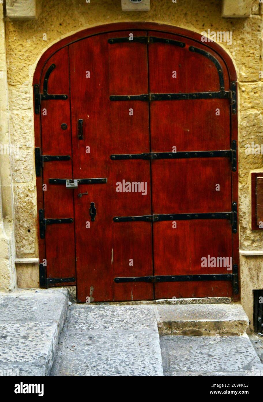 Colorful traditional Maltese doors in the old town of Valletta, Malta ...