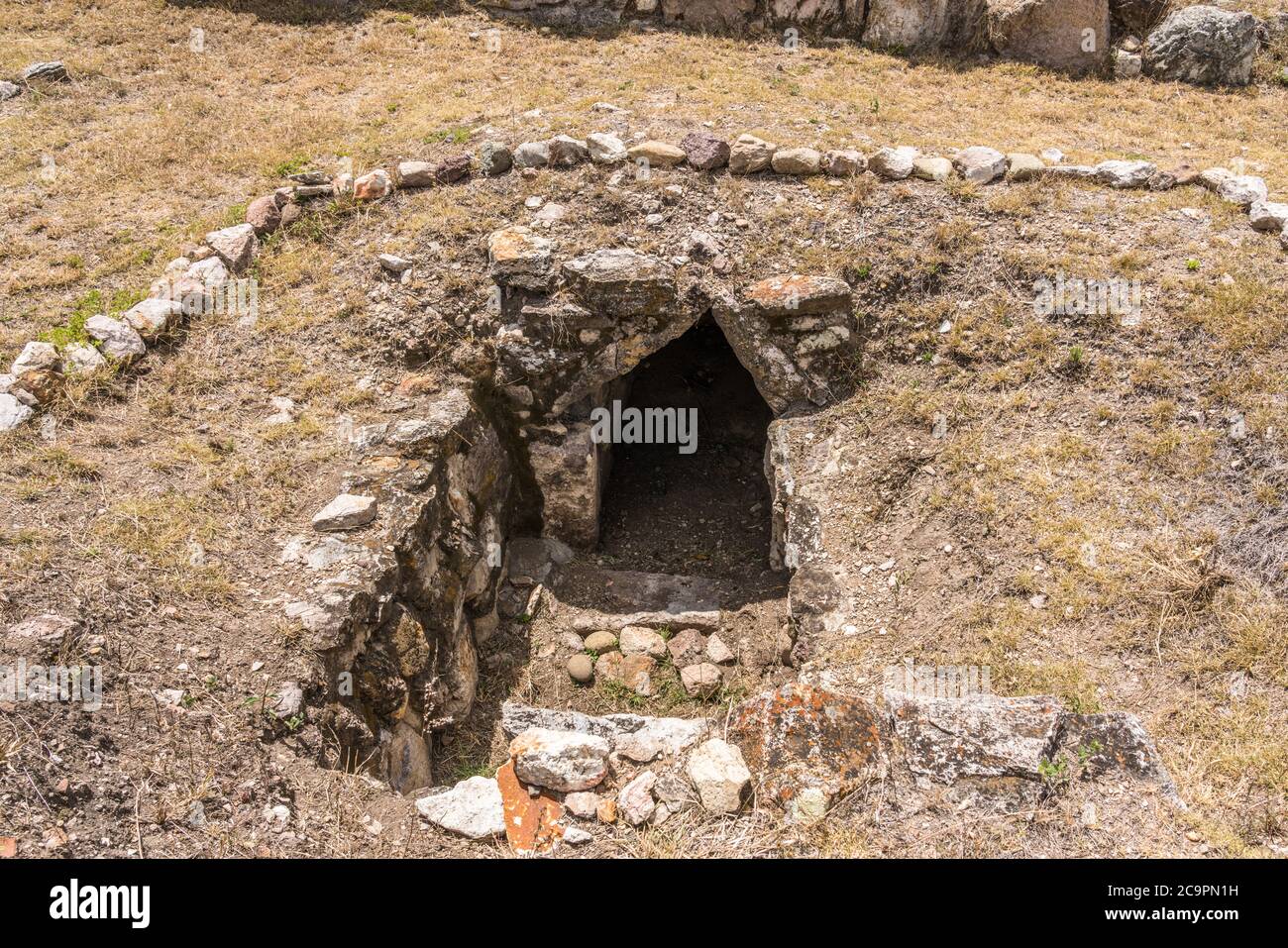 A partially excavated tomb in the ruins of the pre-Hispanic Zapotec ...