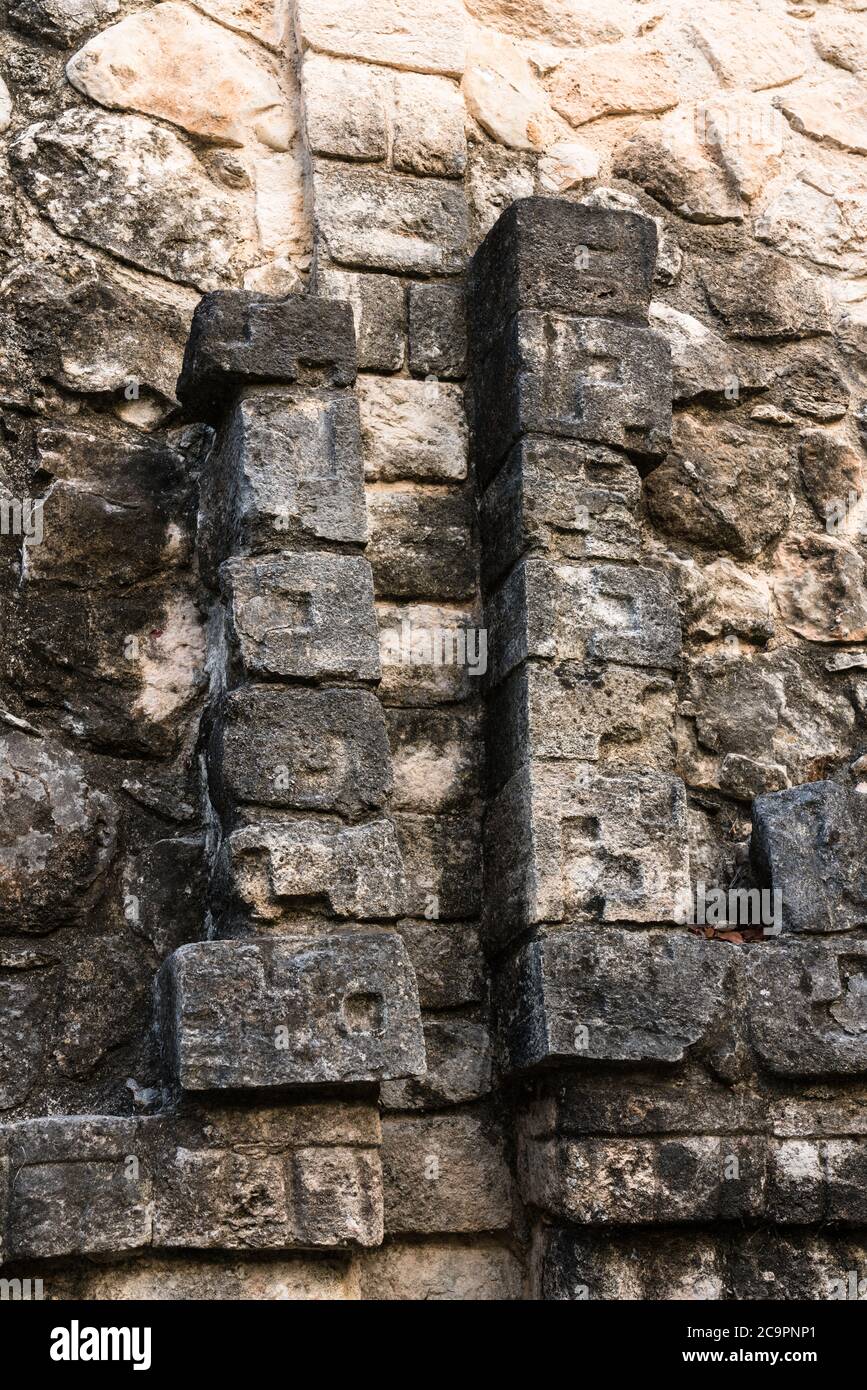 Carved stone glyphs on a wall of the Acropolis in the pre-HIspanic ...