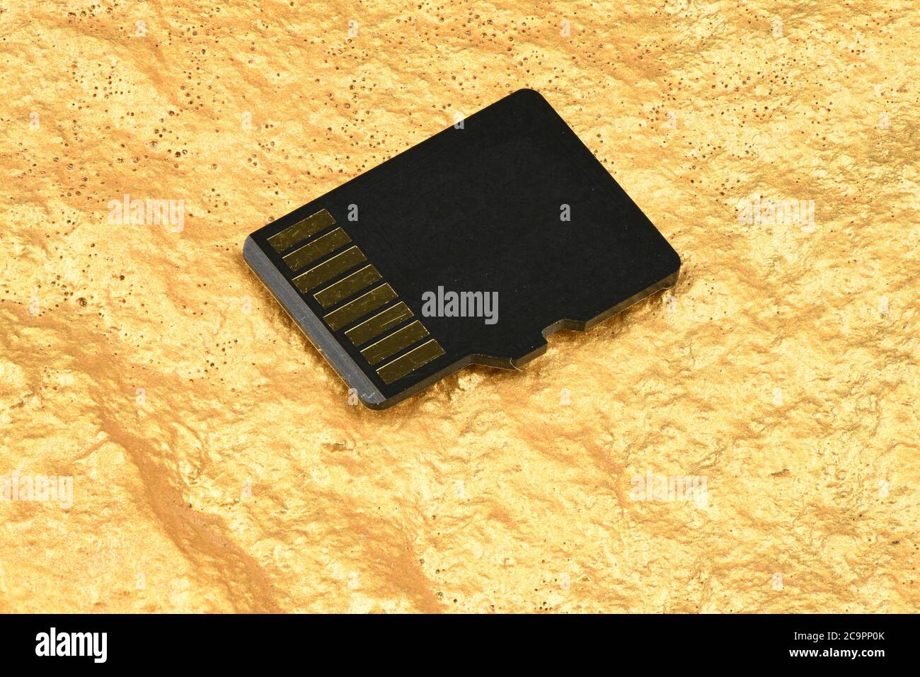 SD memory card isolated on gold background. High resolution photo. Full ...