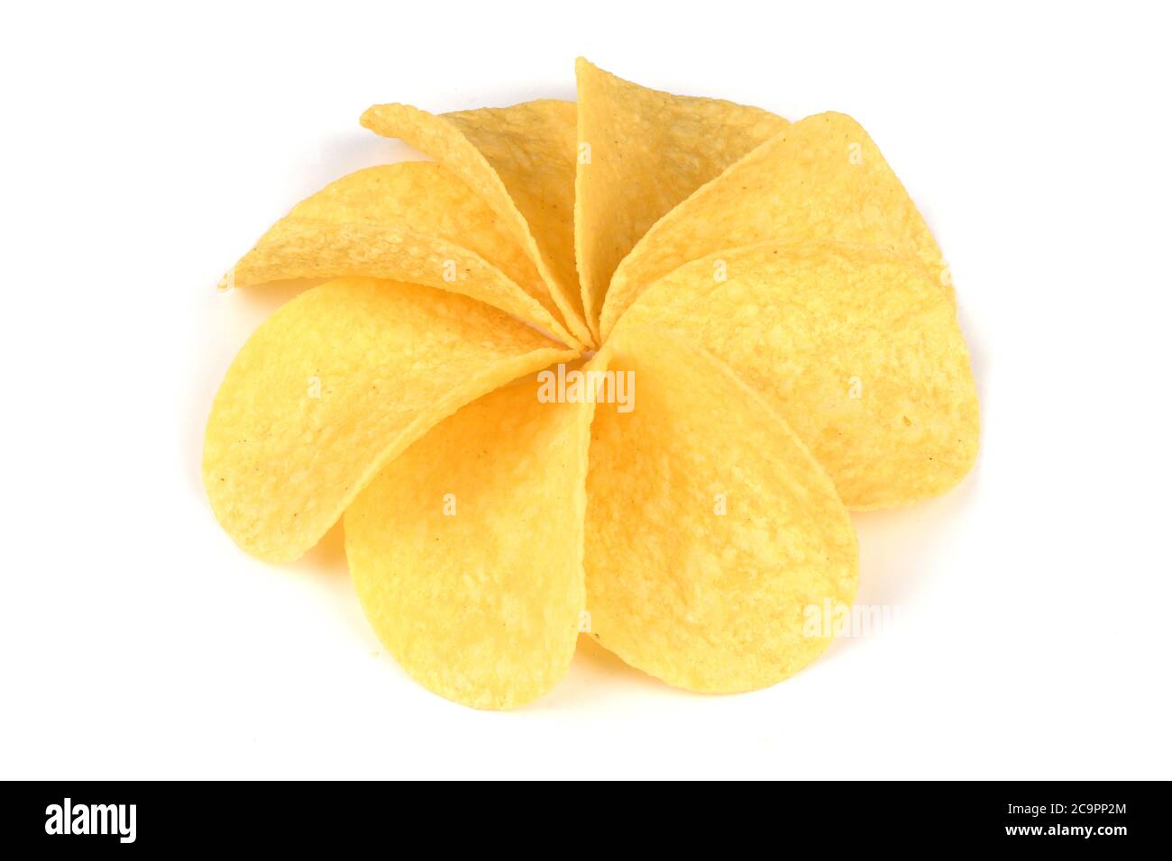 Tasty crispy potato chips in shape of circle isolated on white ...