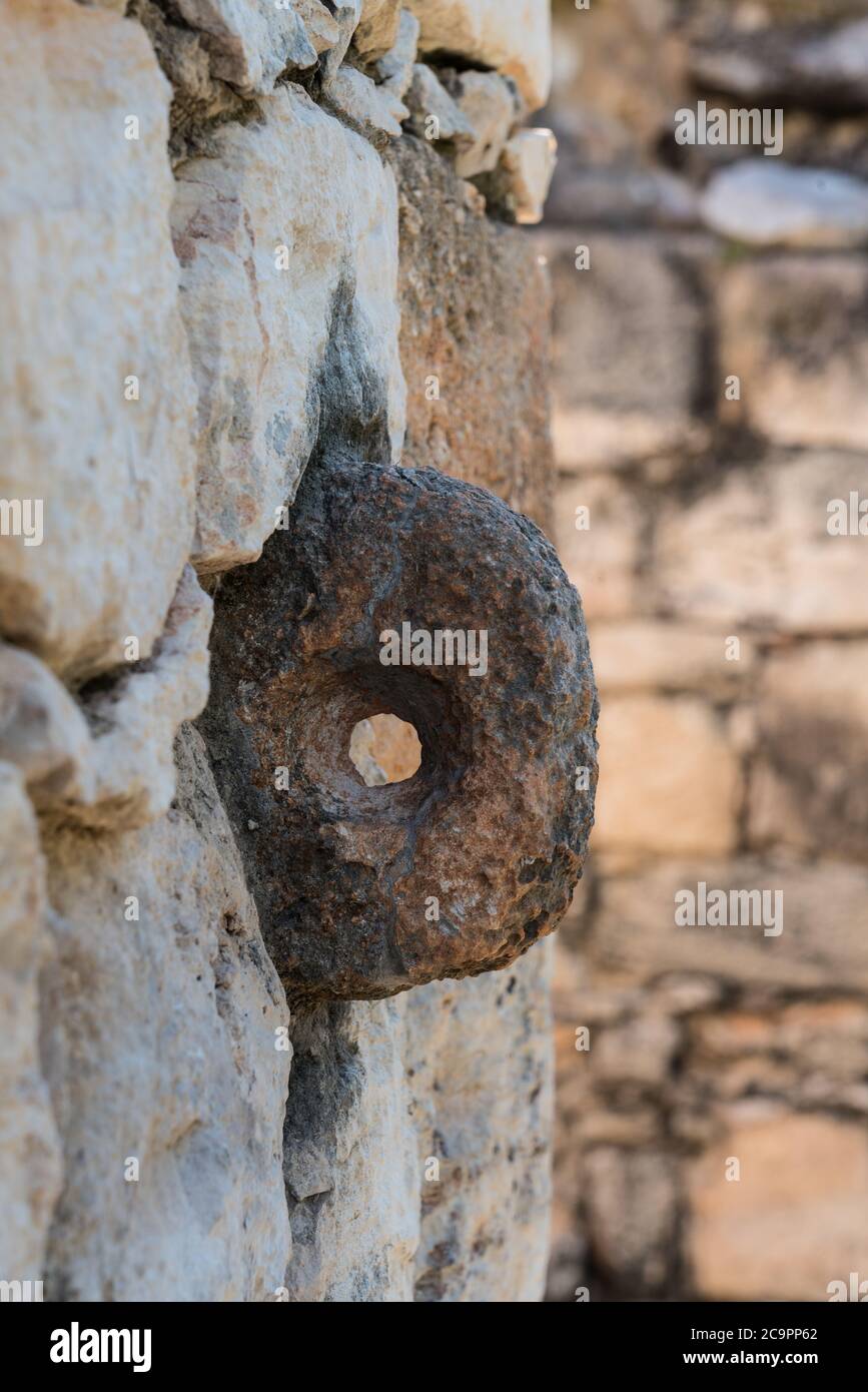Small stone rings set in the walls of the twin temples atop Structure ...