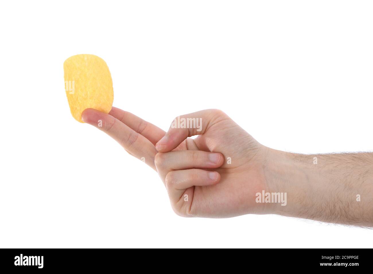 Male hand holding potato chip. Isolated on white background. High ...