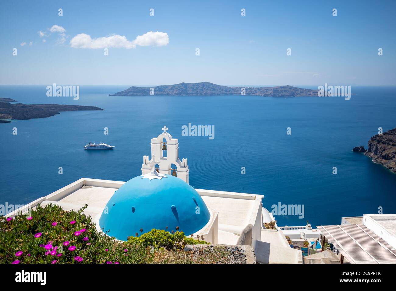 Fira and blue dome, Santorini, Greece. Famous travel destination, blue ...