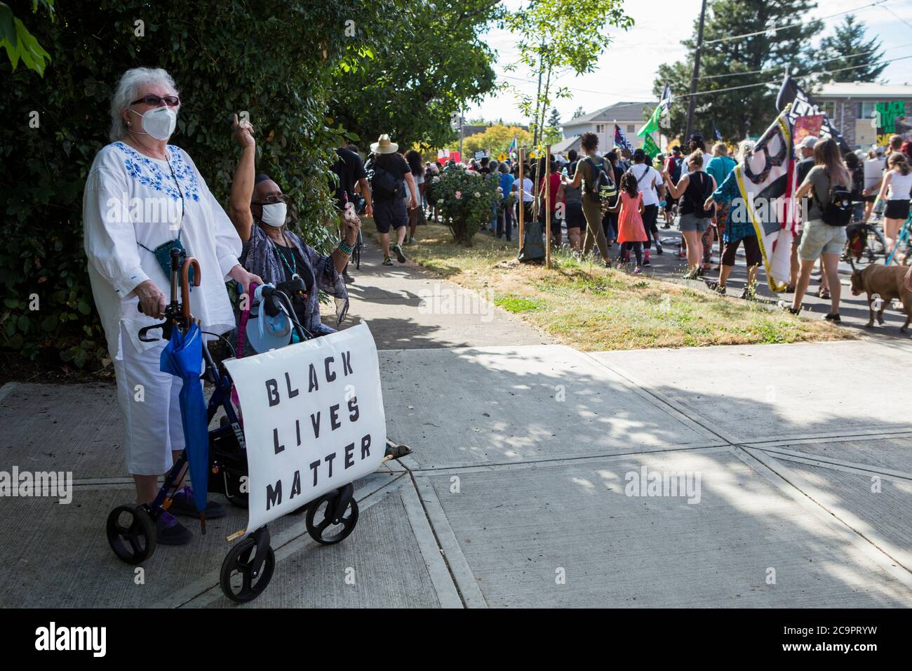 Portland, OREGON, USA. 1st Aug, 2020. LYDIA NEWCOMB, 76, center, and ...