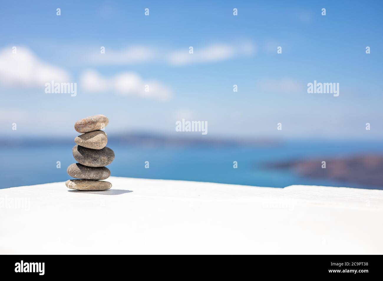 Stones balance, pebbles stack on seascape view. Relaxing concept, white ...