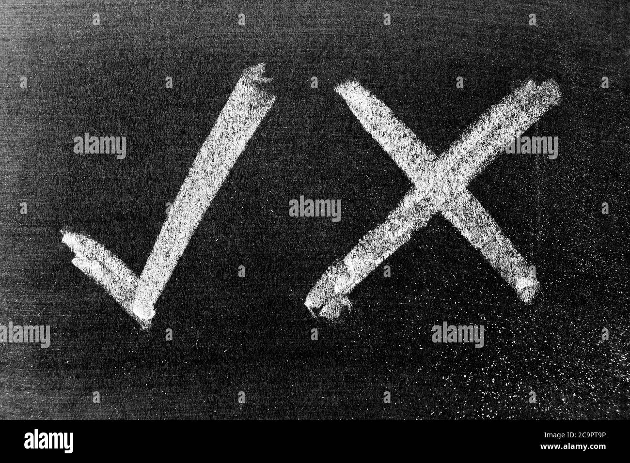 White color chalk hand drawing in check mark of right and wrong shape ...