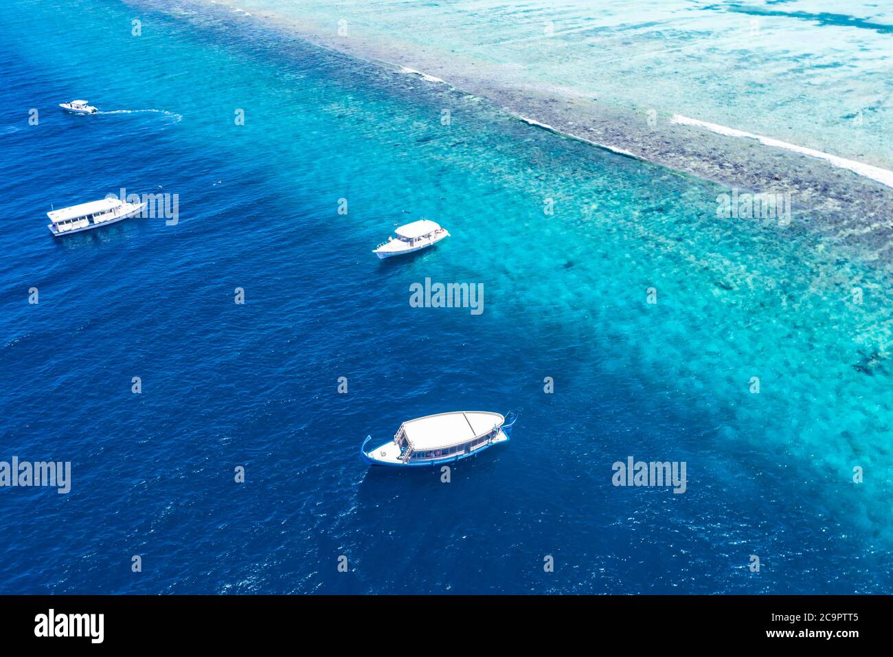 Beautiful turquoise ocean water boat top view aerial photo. Aerial view ...