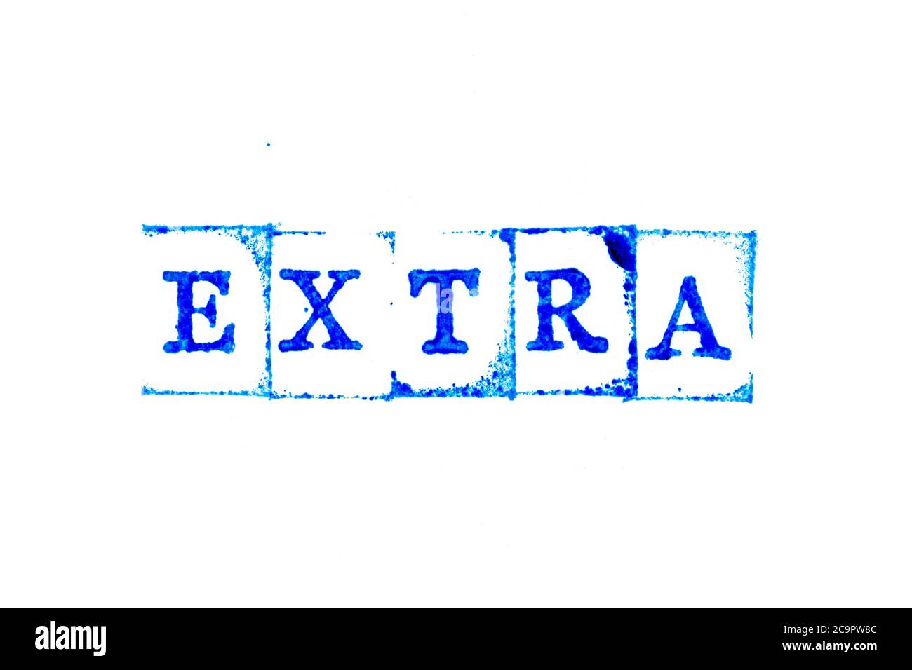 Blue color ink of rubber stamp in word extra on white paper background ...
